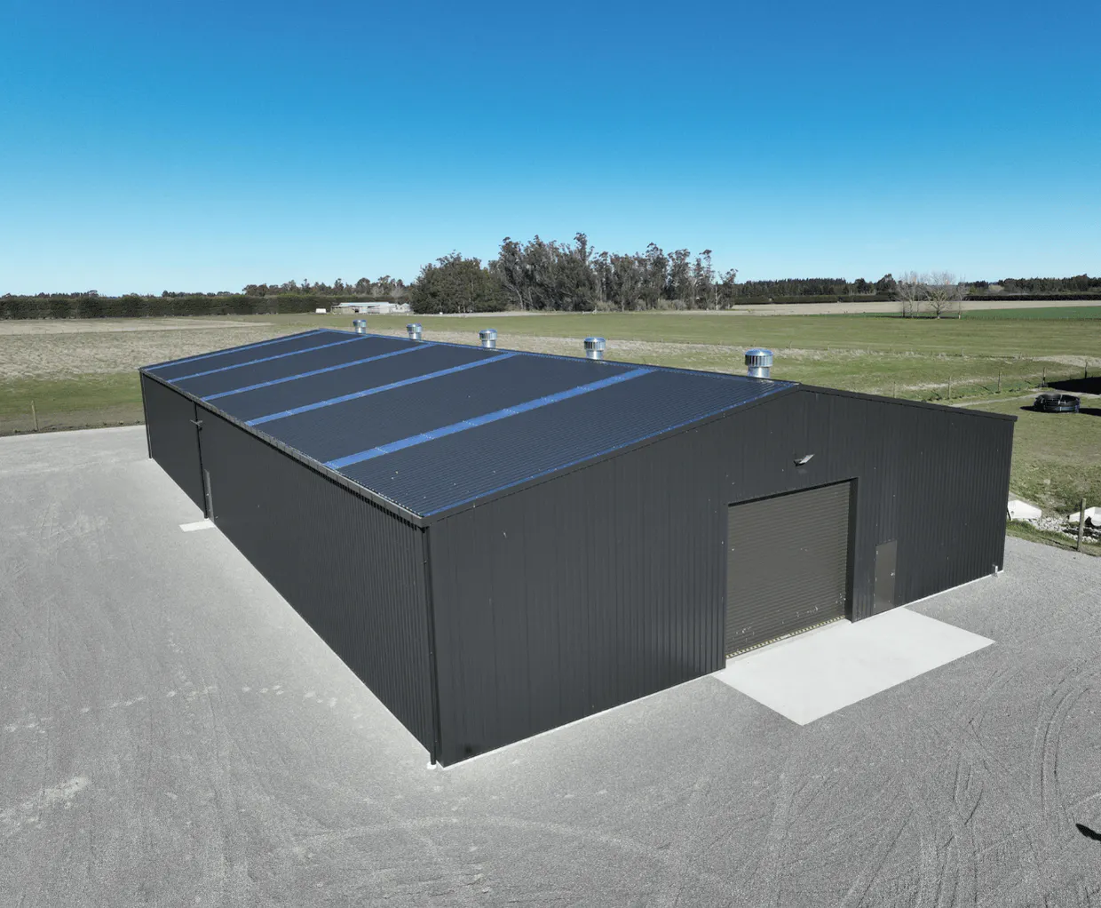 Purpose-Built Cricket Club Shed in COLORSTEEL® Flaxpod | Wide Span Sheds NZ